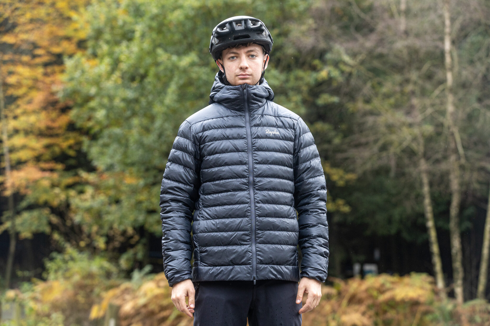 Rapha's Explore Down Jacket is exceptionally snug and warm for riding, and still packs small ...