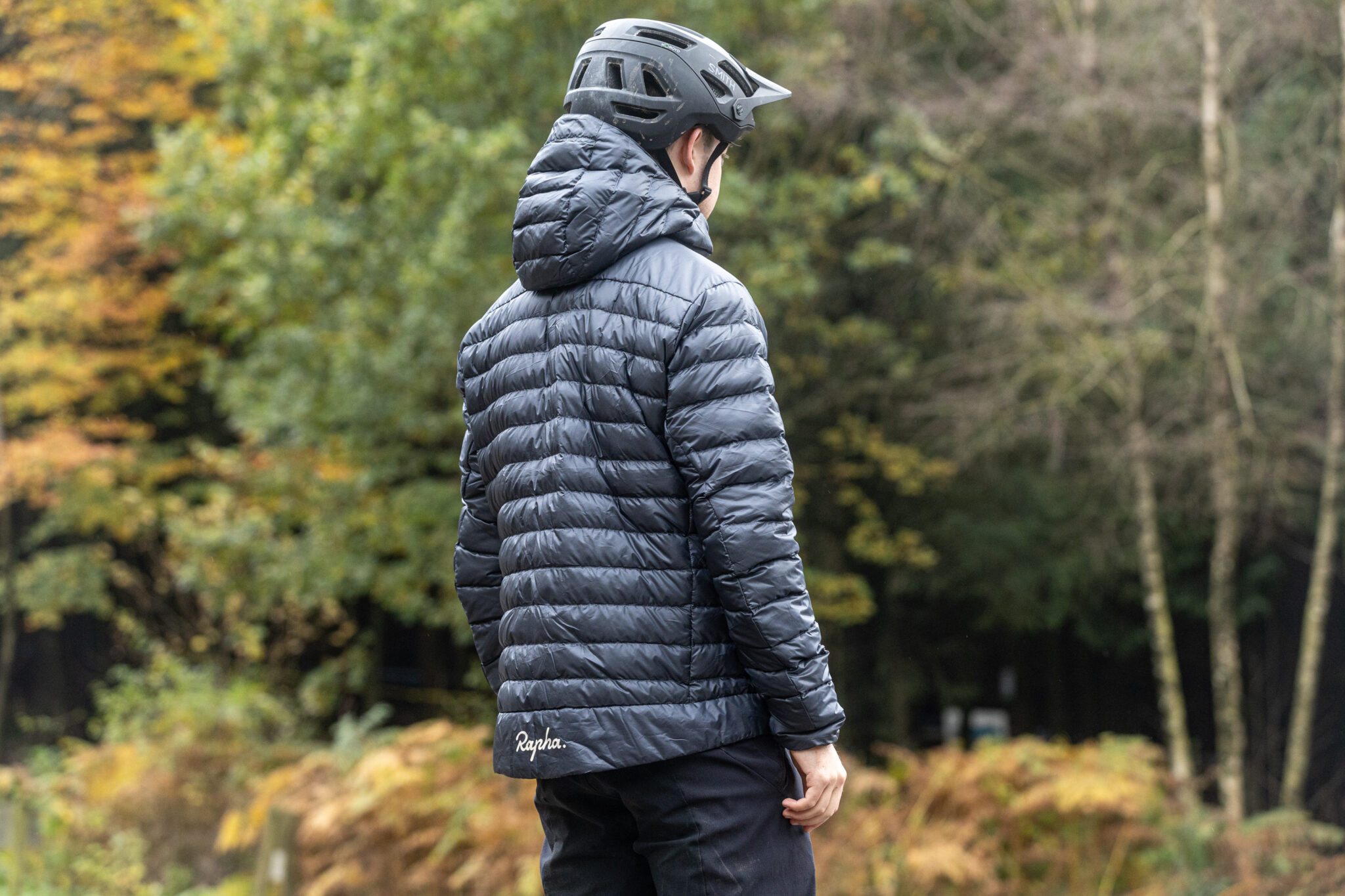 Rapha's Explore Down Jacket is exceptionally snug and warm for riding, and still packs small ...