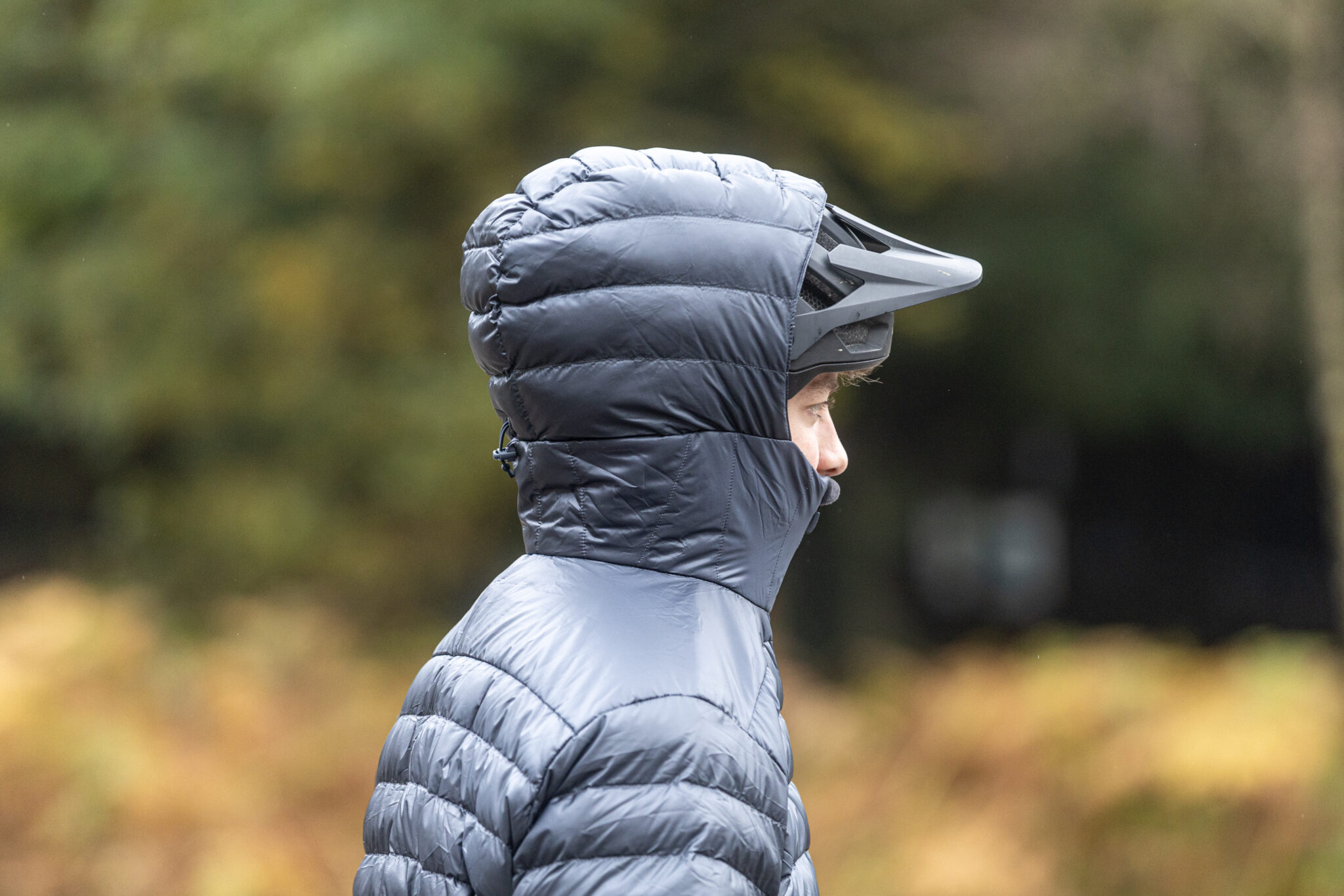 Rapha's Explore Down Jacket is exceptionally snug and warm for riding, and still packs small ...