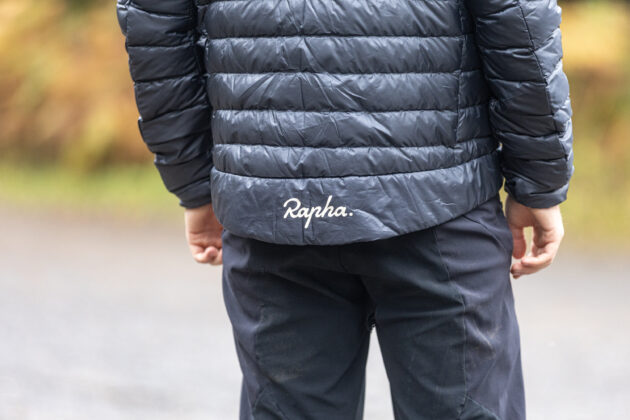 Rapha's Explore Down Jacket is exceptionally snug and warm for riding, and still packs small ...