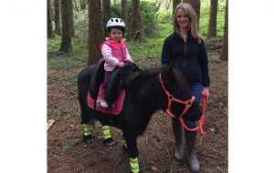 “This is my daughter Liberty and her Shetland pony, Blackie. We have ...