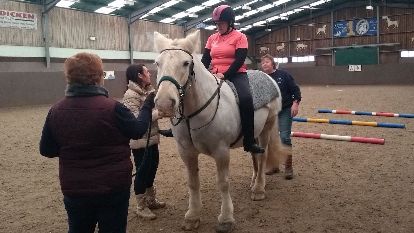 Rider paralysed in freak fall gets back in the saddle for the first ...