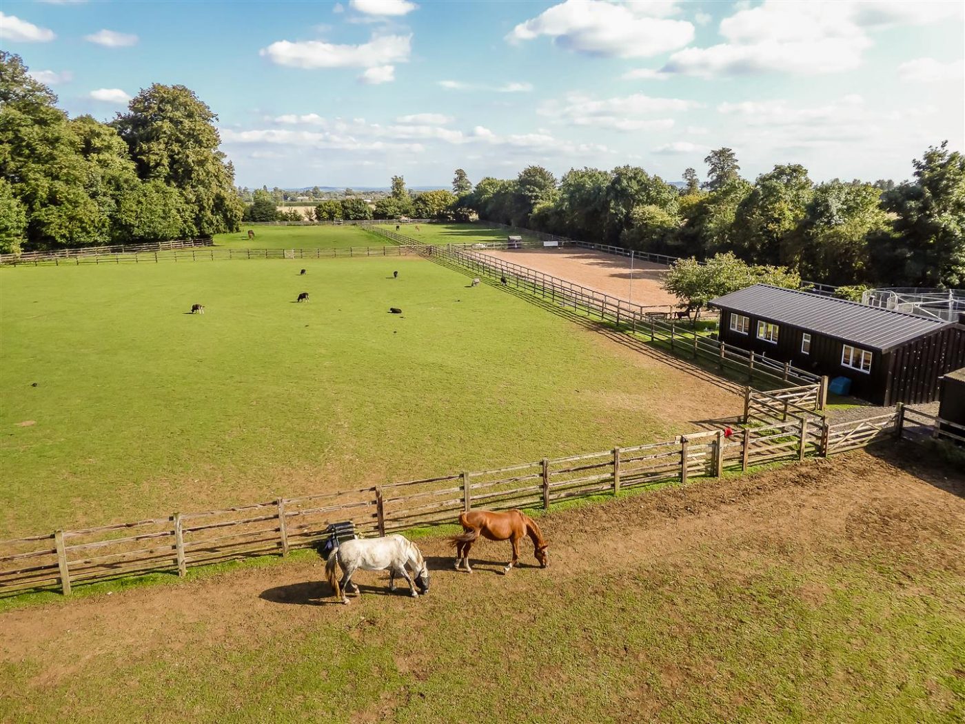 What a beauty! A countryside nest with 10 stables, 8 acres, wash bay ...