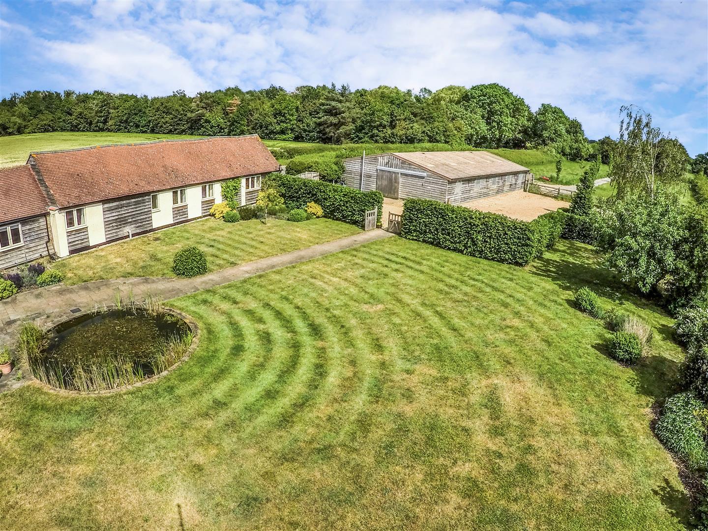 A beautiful barn conversion with countryside views, all-weather arena ...
