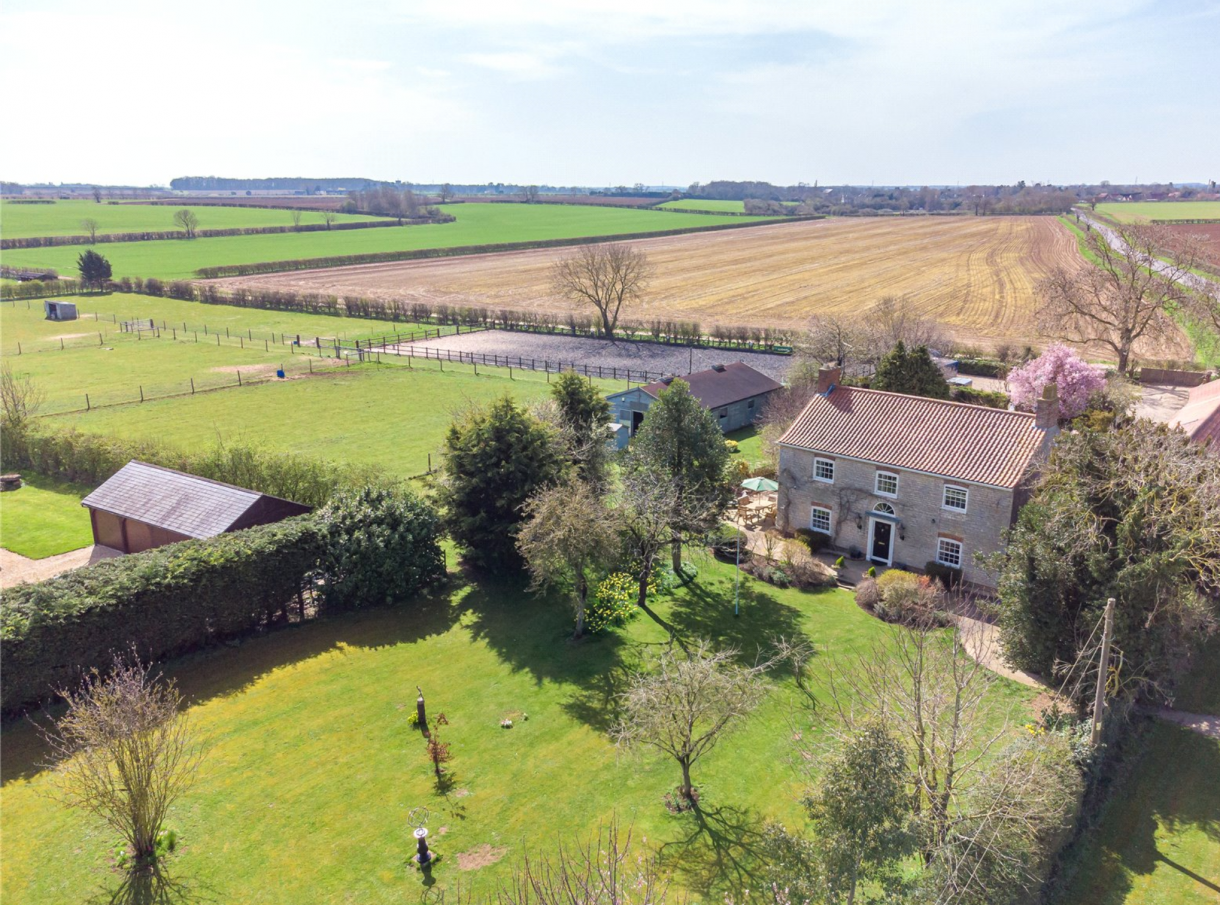 Take a look around this 6-bedroom home, set in 5 acres with stables and ...