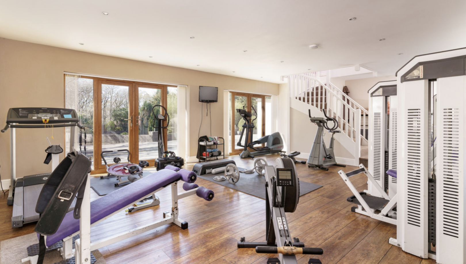 Move into this six-bedroom home, complete with stables, pool and gym ...