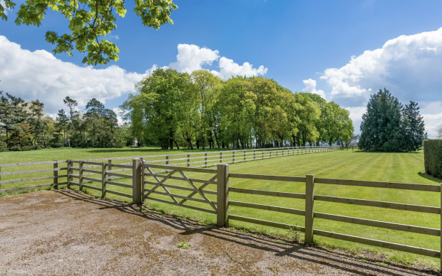 Take a look around this 12-bedroom house with 18 stables, nine acres, a ...