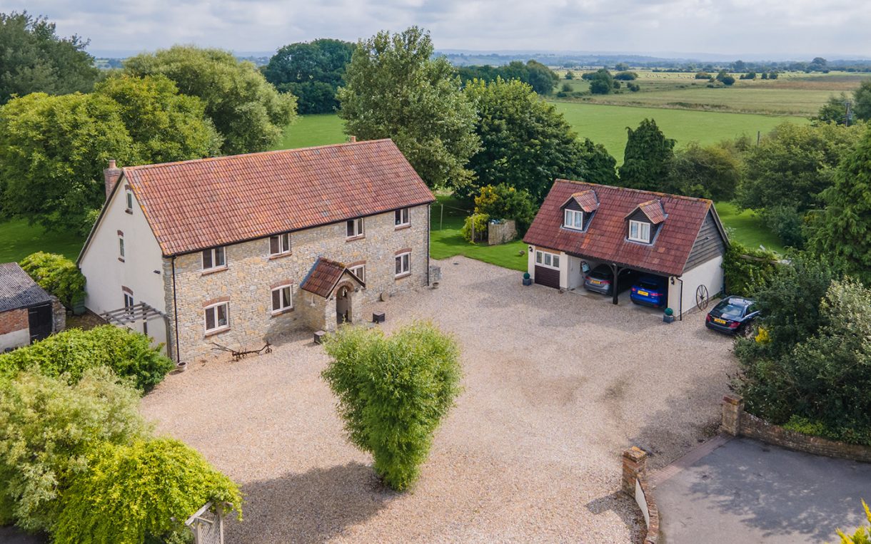 Make a home for life out of this farmhouse complete with 10 stables ...