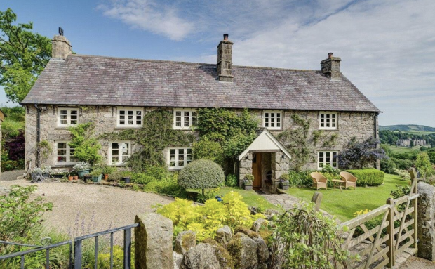 Settle into this equestrian property with up to 88 acres, stables, an ...