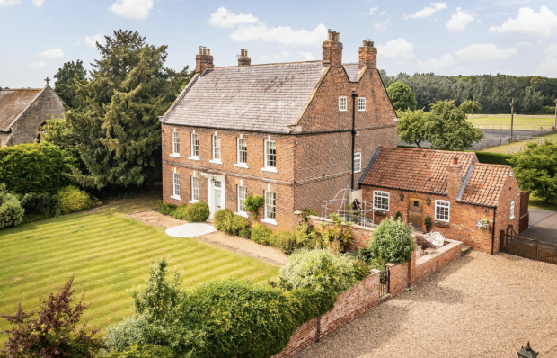 Take a look around this Georgian manor house, complete with arena ...