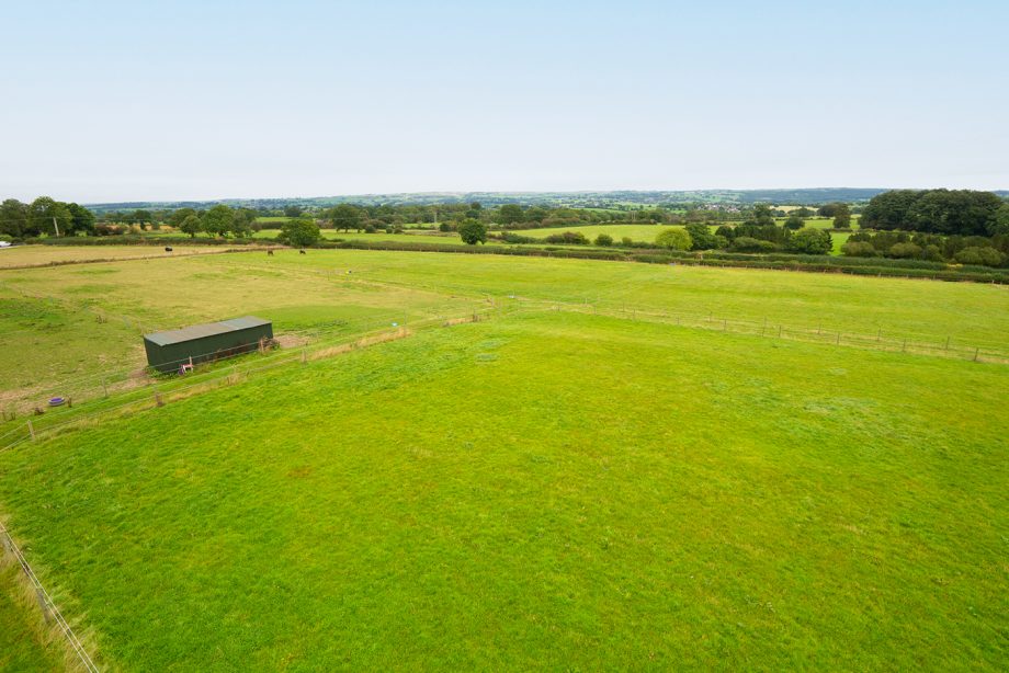 Buy your dream yard — with 12 indoor stables, floodlit school, 18 ...