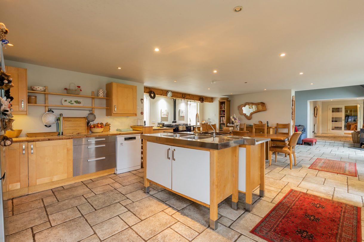 A traditional farmhouse with lots of land, two stables and outdoor ...