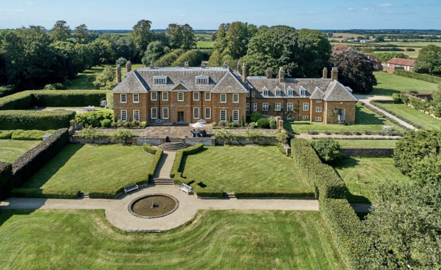 A Grade II-listed manor with 12 stables, over 11 acres, swimming pool ...