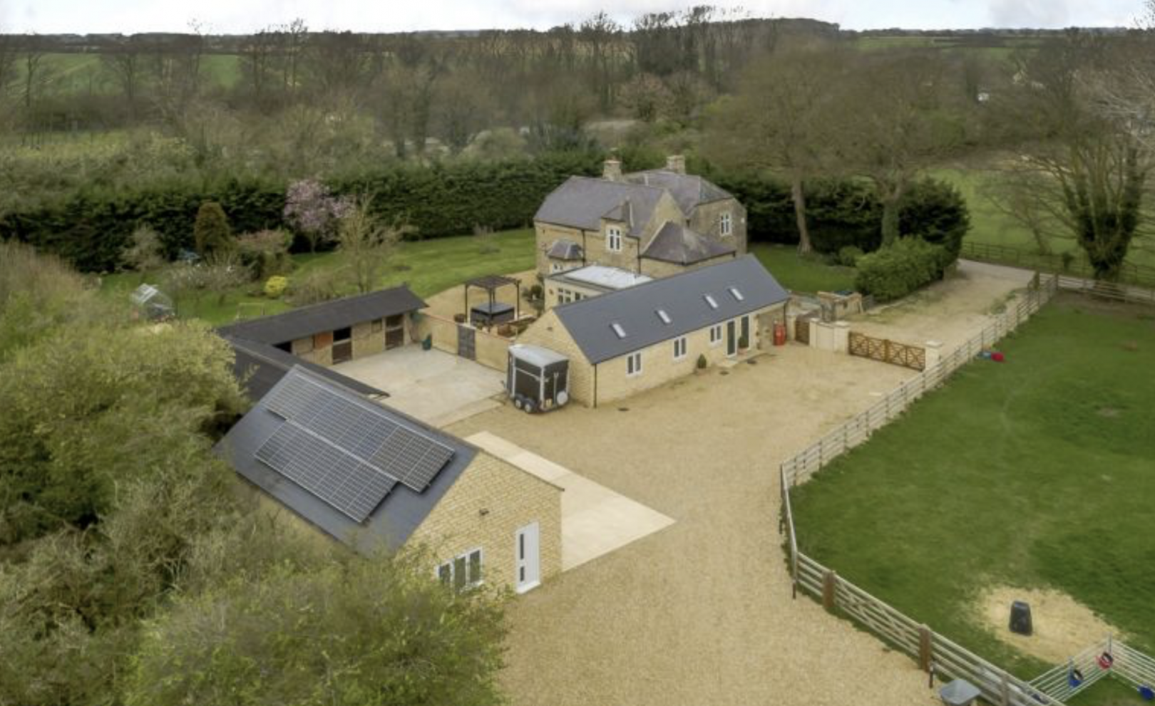 Check out this 4-bed country home, complete with 10 acres, 5 stables ...