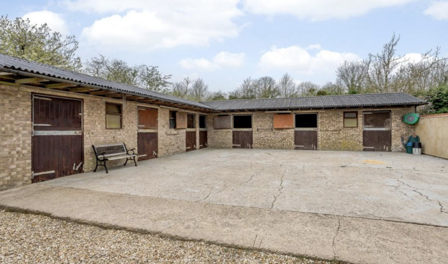 Check out this 4-bed country home, complete with 10 acres, 5 stables ...
