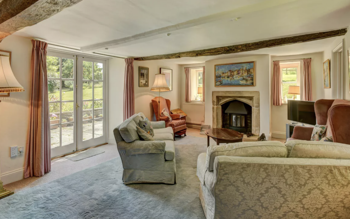 Take a look around this farmhouse set in +14 acres with 7 stables and a ...