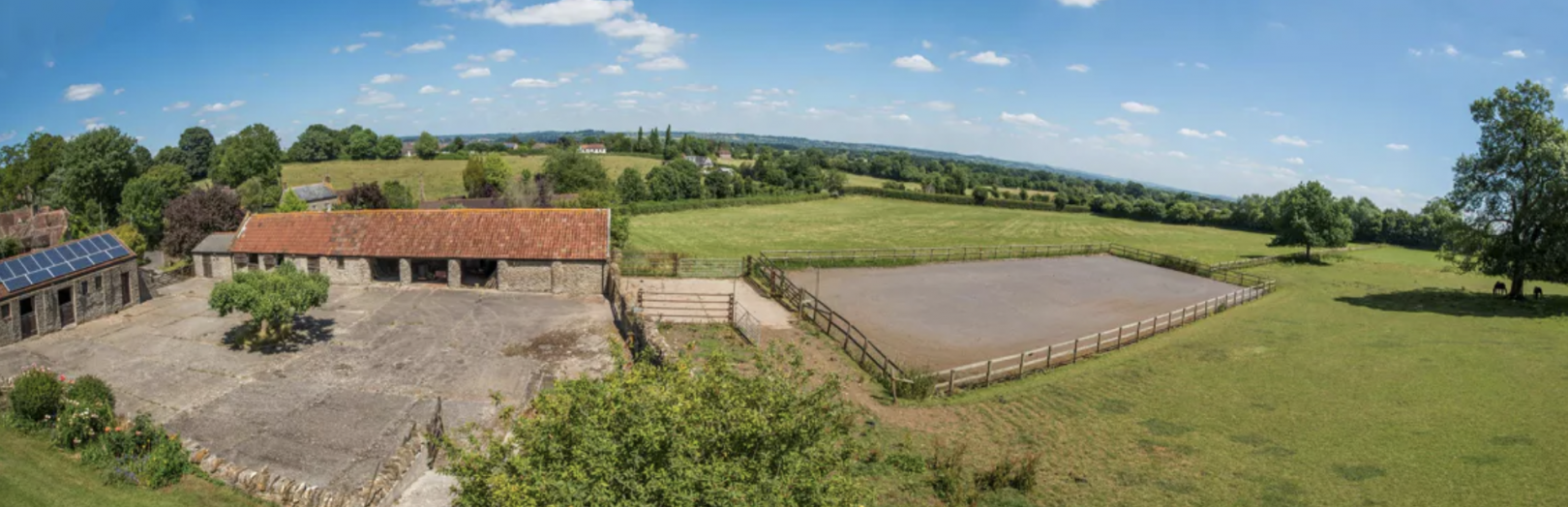 Take a look around this farmhouse set in +14 acres with 7 stables and a ...