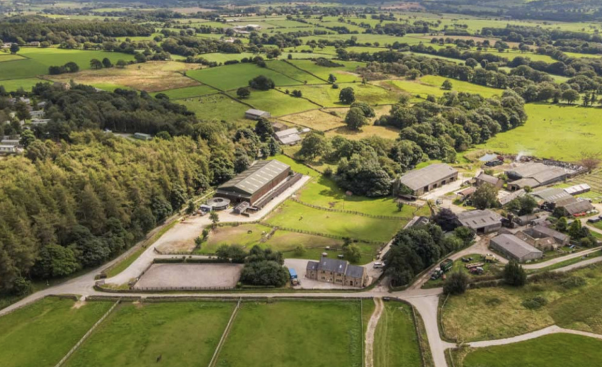 Take a look around this 9-bedroom home with indoor and outdoor arenas ...