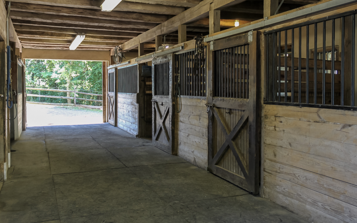 Check out this 33-acre estate with a 7-bed principle house, stables ...