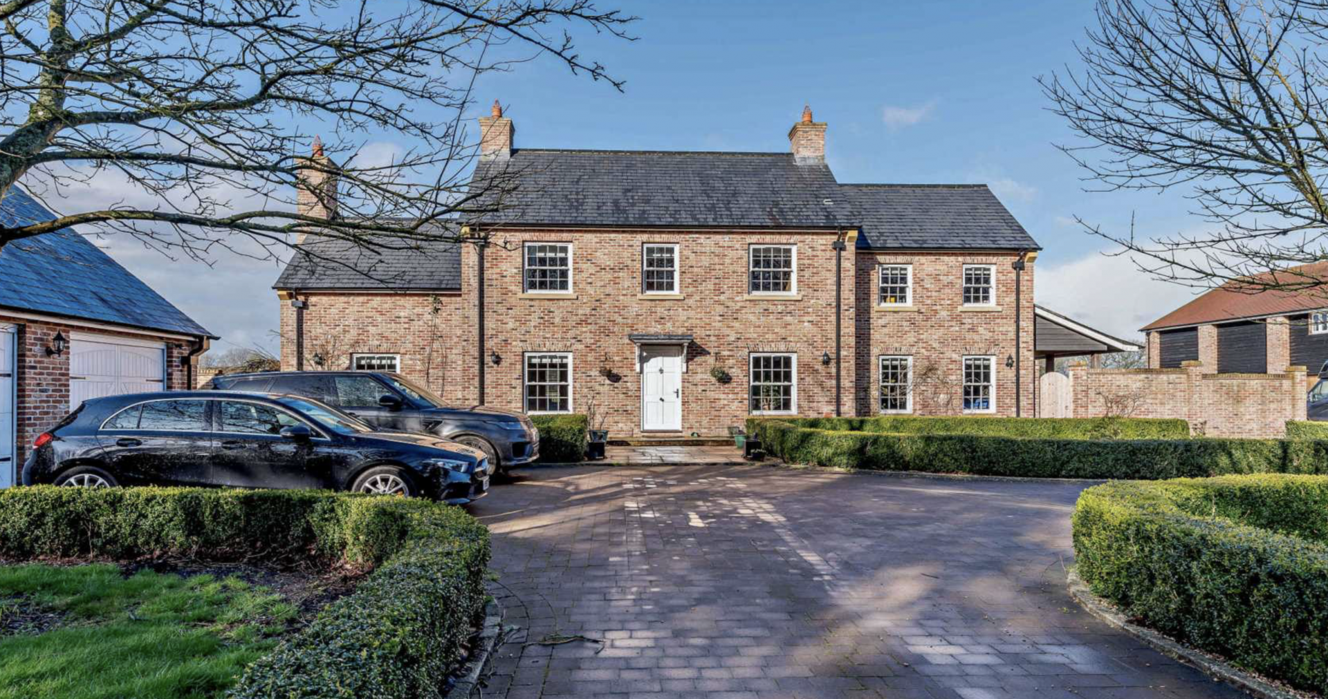 A 5-bed home with 11 stables, arena (with planning for an additional ...