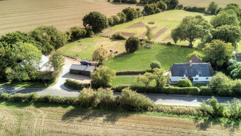 A super-cosy thatched cottage with 3 stables and paddocks situated in ...