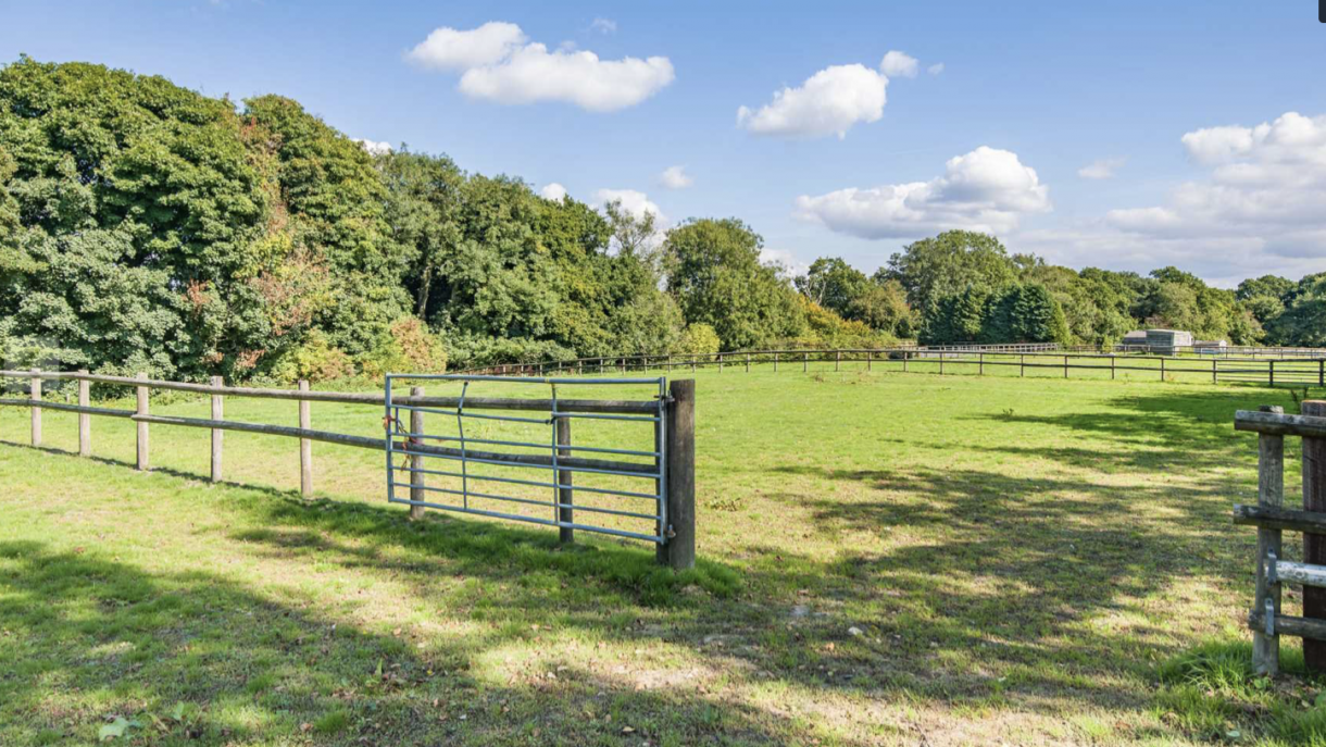 A slice of horsey heaven complete with stables, grazing and an arena ...