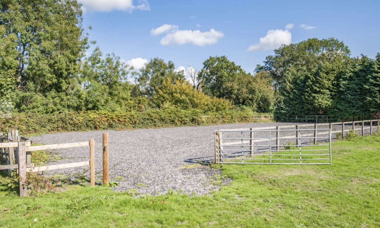 A slice of horsey heaven complete with stables, grazing and an arena ...