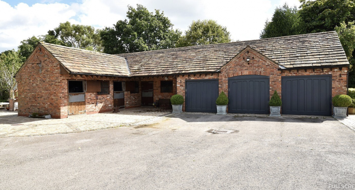 Take a tour of this country house with stables in more than six acres ...