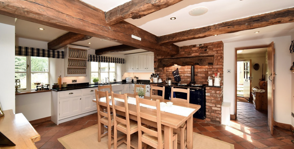 Take a tour of this country house with stables in more than six acres ...