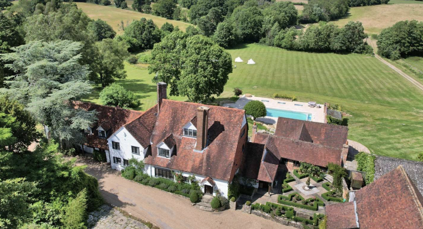 A 16th Century farmhouse with indoor and outdoor arenas, stables, 95 ...
