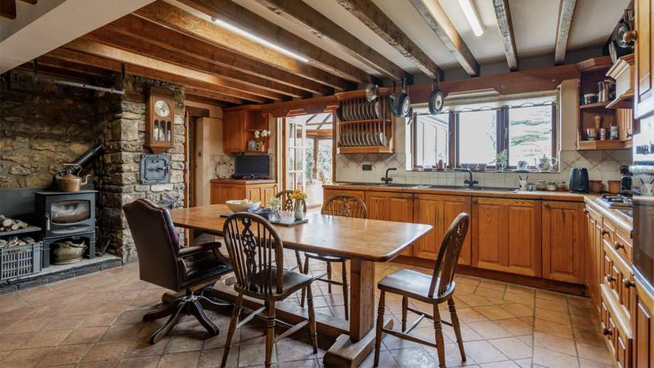 A barn conversion next to the beach with two stables and over 13 acres ...