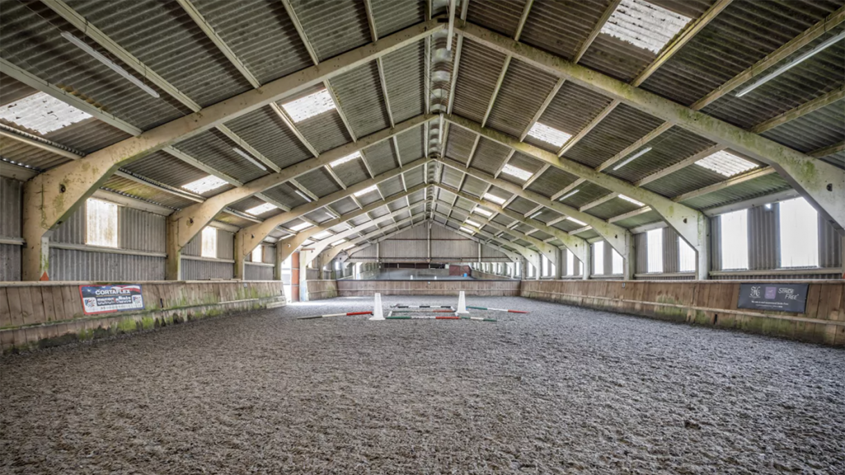 A Grade II-listed home in over 87 acres, with stables, indoor and ...