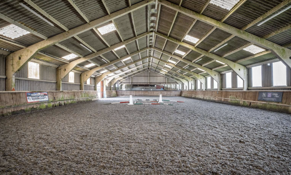 A Grade II-listed home in 88 acres, with stables, indoor and outdoor ...