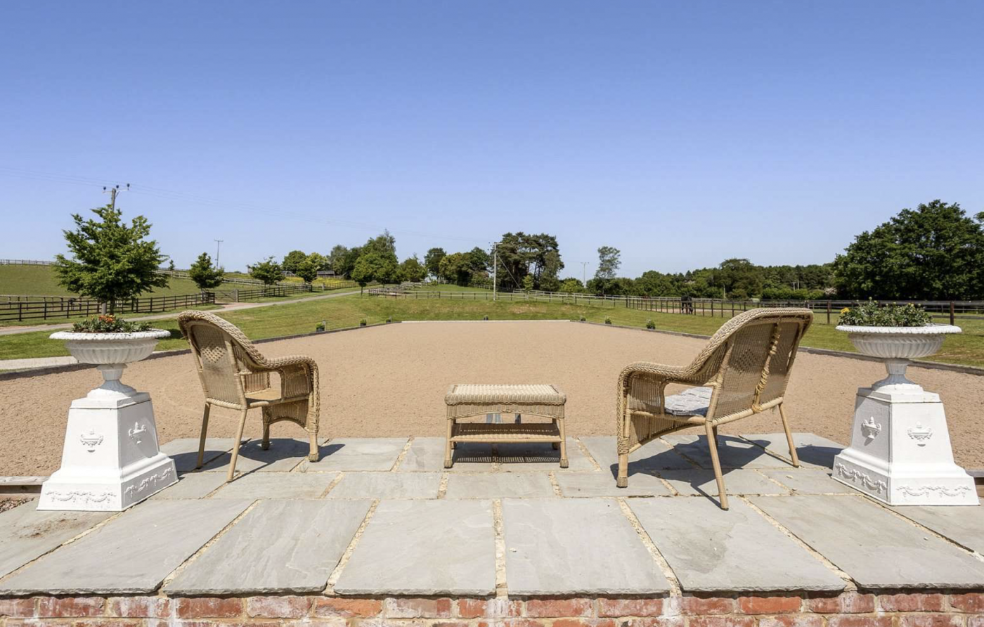 A 17th century house with indoor and outdoor arenas, plenty of stables ...