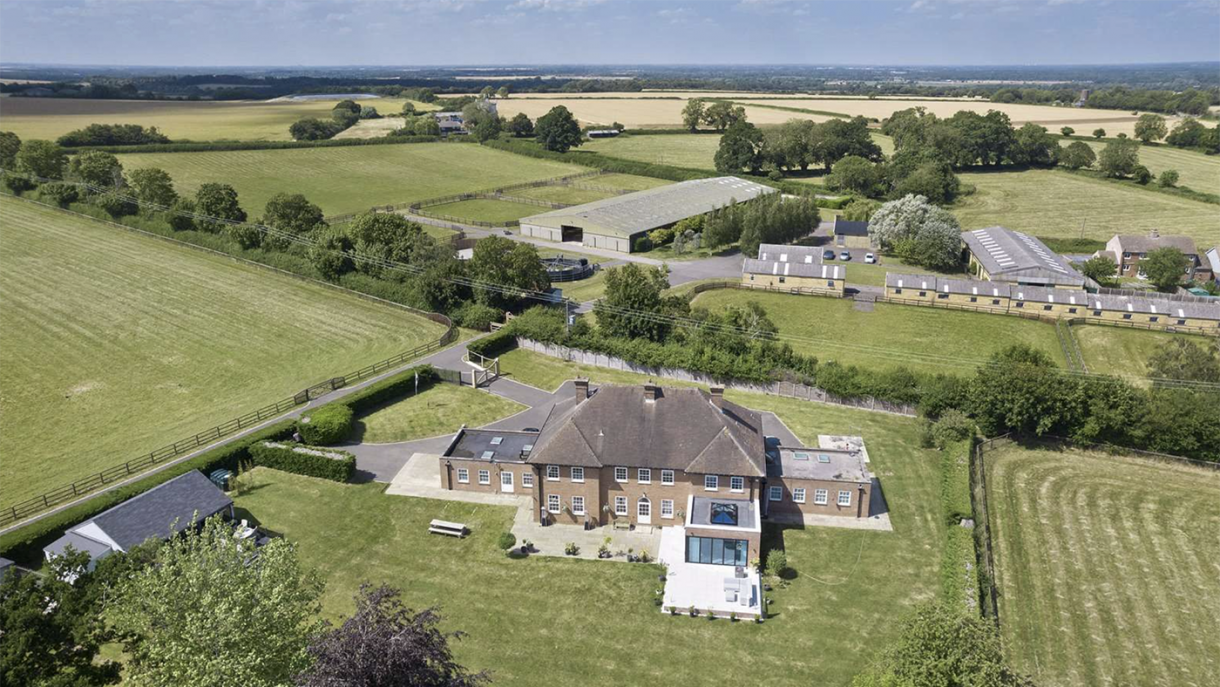 A former racehorse stud with 60 stables, 19 paddocks and a lavish five ...