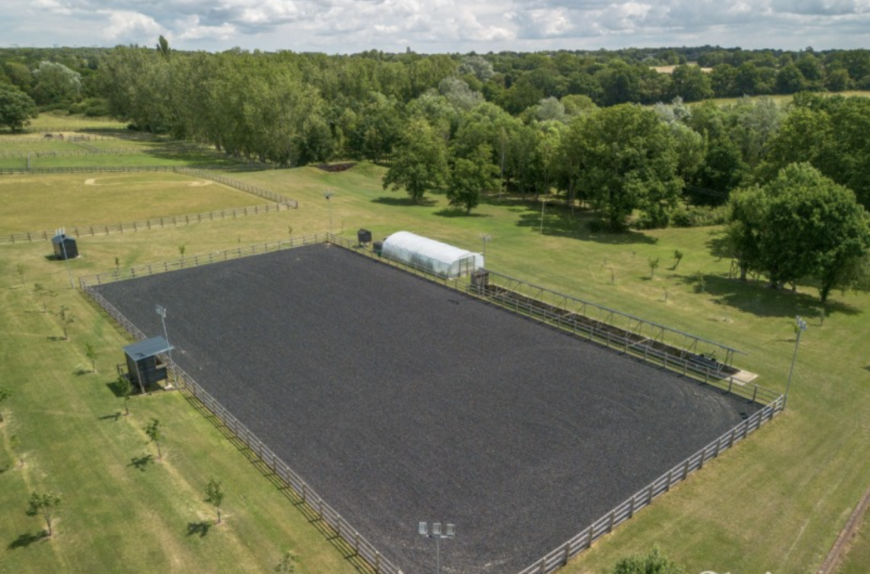 A horsey haven with floodlit arena, stables, 15 acres, swimming pool ...