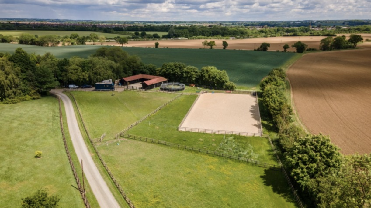 Fancy a barn conversion with gallop track, stables, arena and duck pond ...