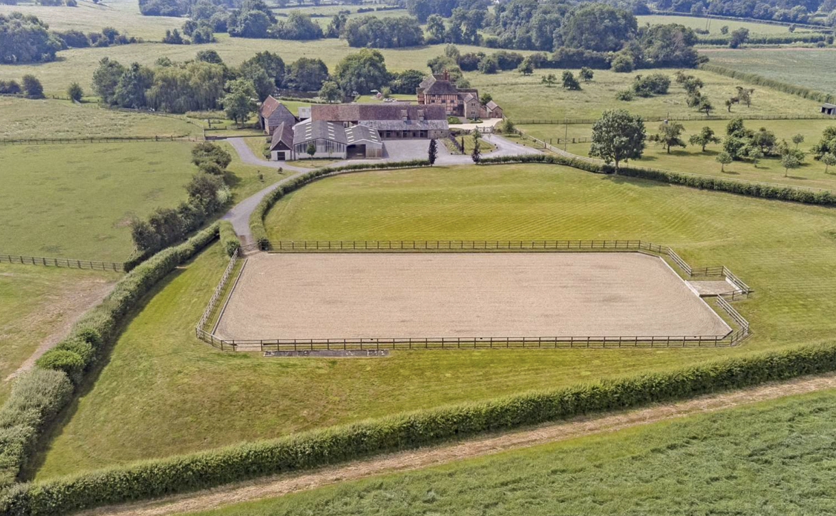 A 16th Century estate with arena, Derby field, stables, planning for an ...
