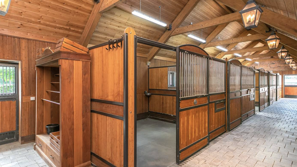 A jaw-dropping yard with three homes, indoor arena, canter track and ...