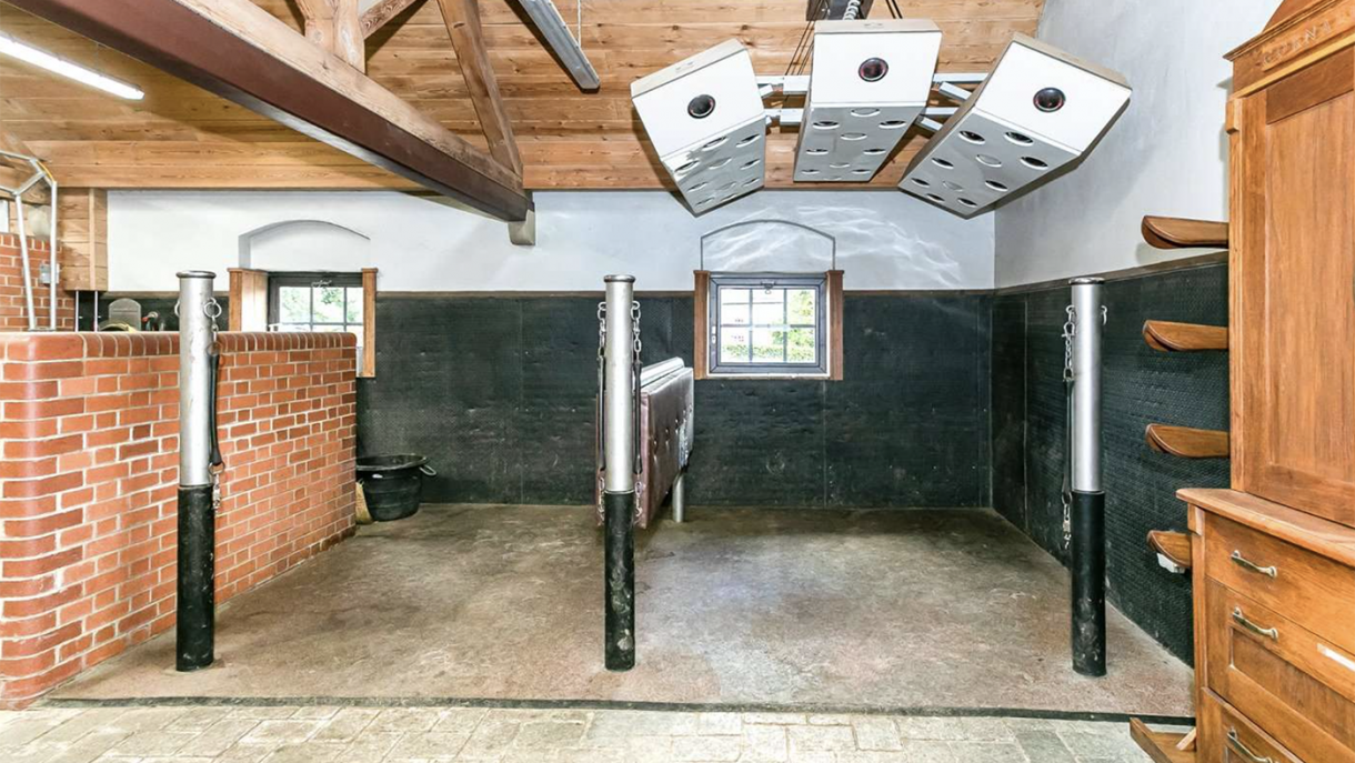 A jaw-dropping yard with three homes, indoor arena, canter track and ...