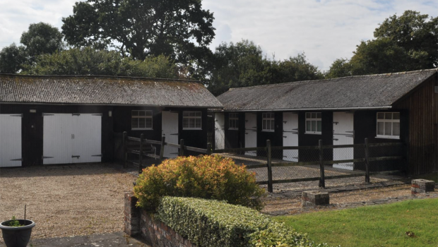 Pay under £700,000 for a cosy cottage with four stables in beautiful ...