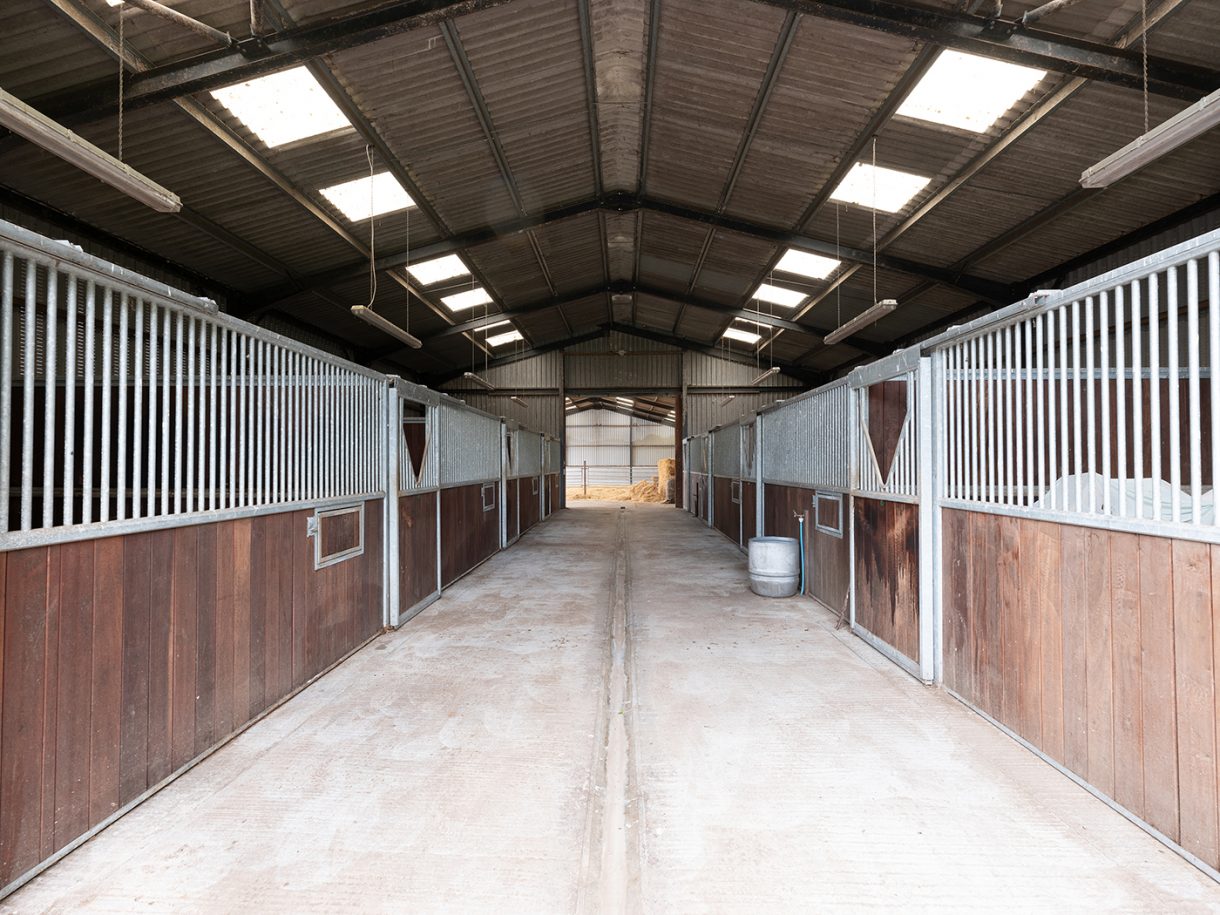A 156-acre farm with house, stables and additional cottage, situated in ...