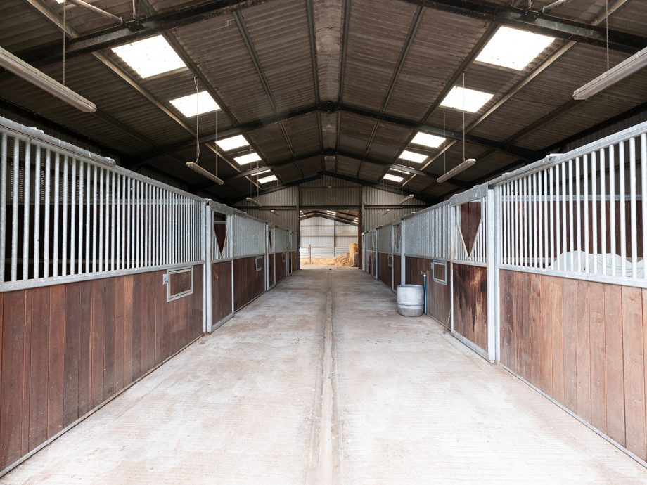 A 156-acre farm with house, stables and additional cottage, situated in ...