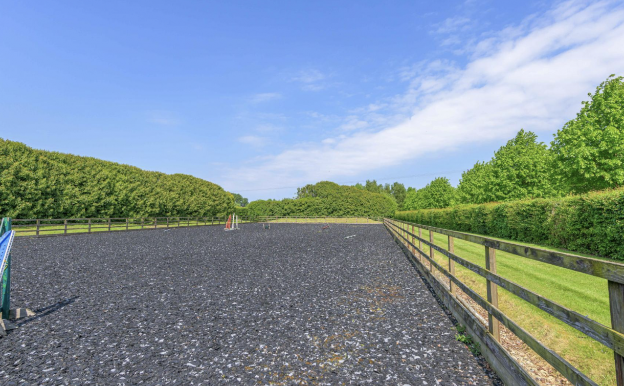 A Georgian hall complete with stables, arena, 24 acres and even its own ...