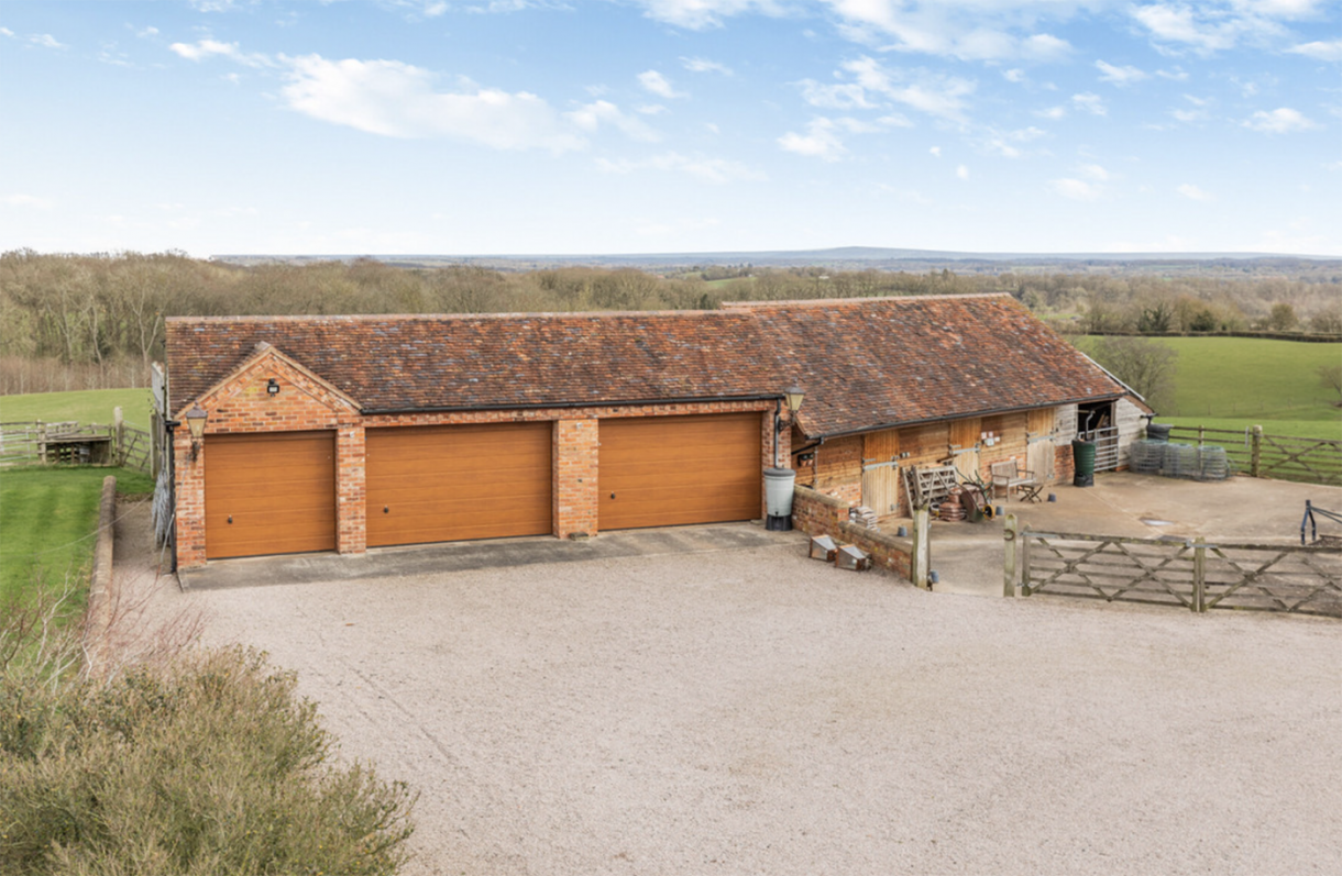 A five-bedroom barn conversion with 27 acres, stables and an annexe, in ...