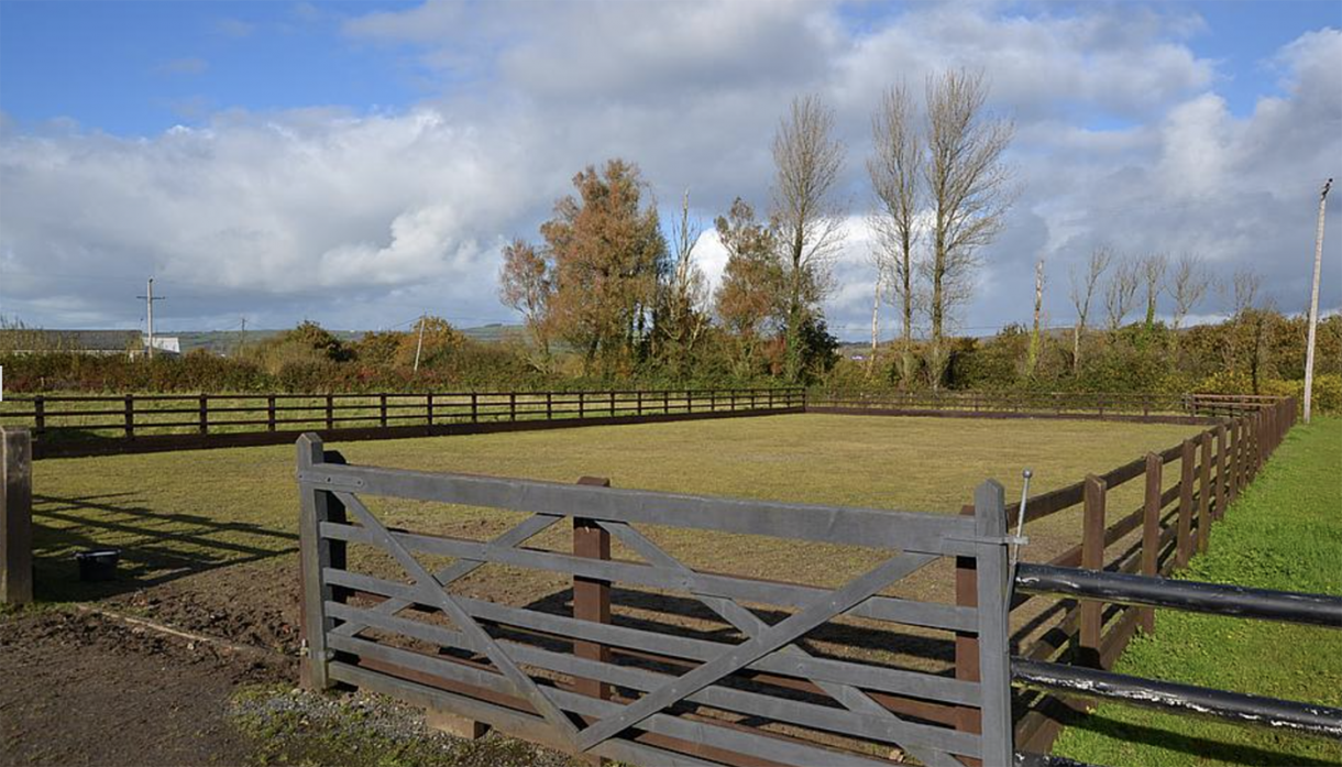 How about a cosy home with five stables, outdoor school and paddocks ...