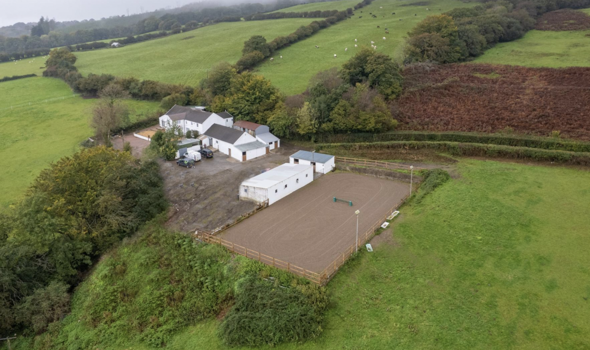 Enjoy country living with stables and an arena (with a view) in easy ...