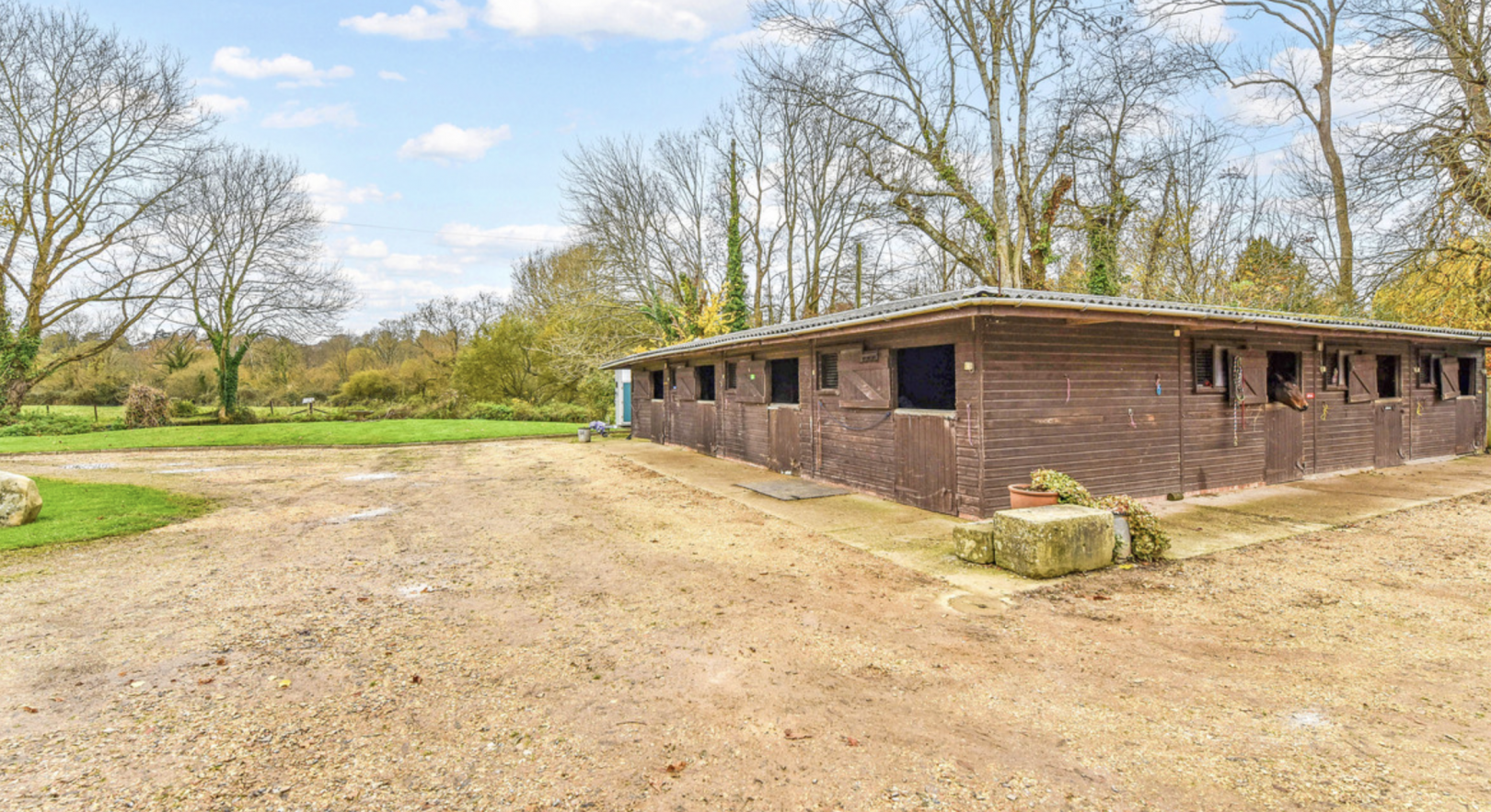 A Grade II-Listed barn conversion with stables, 10 acres and first-rate ...