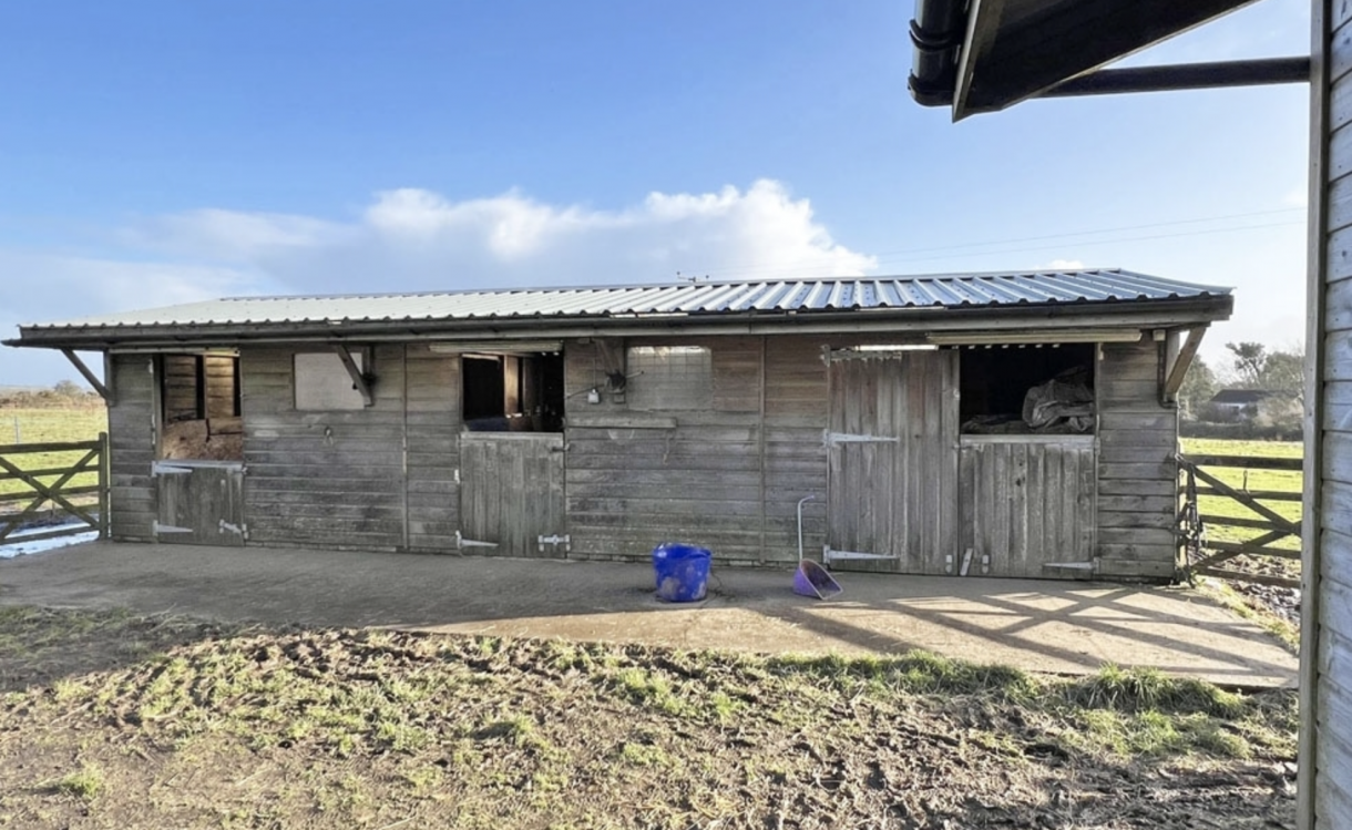 A six-bed farmhouse, stables and a school for under £1m