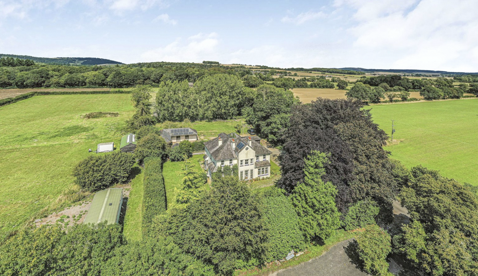 An impressive family home near the coast with stables, grazing and ...